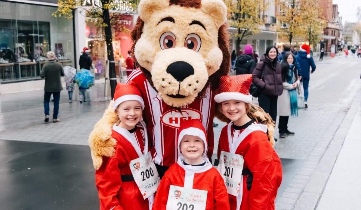 Hundreds take part in Exeter Santa Run as young fundraisers lead the ...