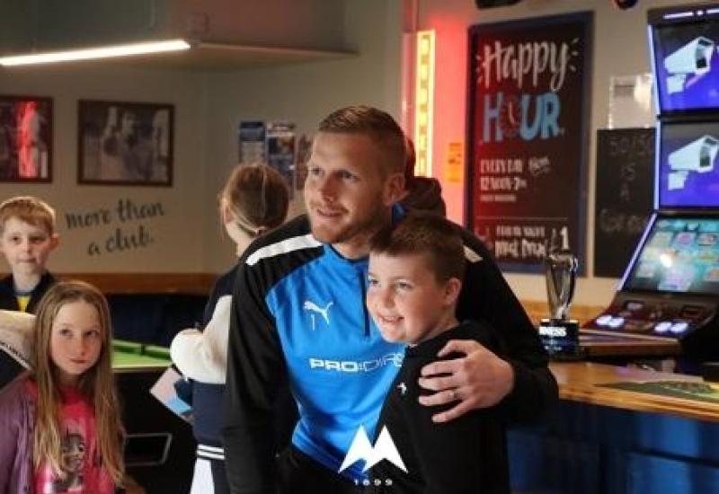 Torquay United players meet young fans during Plainmoor stadium tours ...